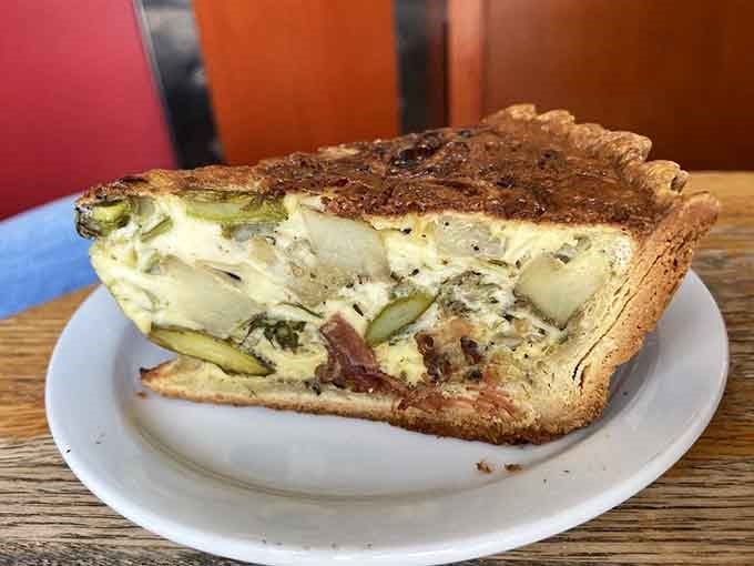 This quiche stands taller than most people's ambitions, and it's got the flavor to back it up.