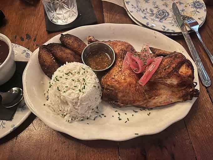 That Pollo Asado sits there looking innocent, but one bite reveals layers of citrus and garlic magic.