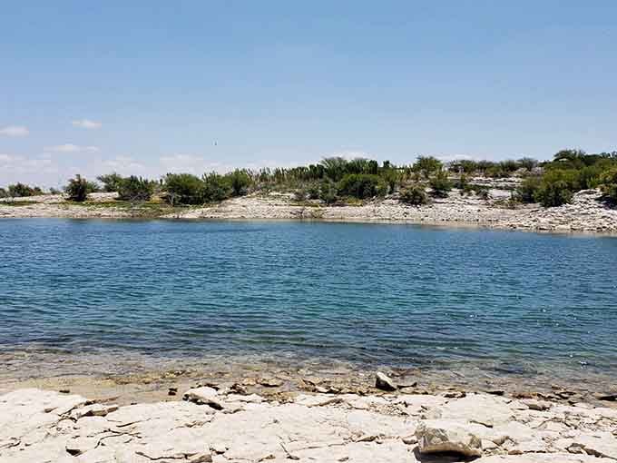 That pristine shoreline and brilliant blue water make you question if you're still in Texas.