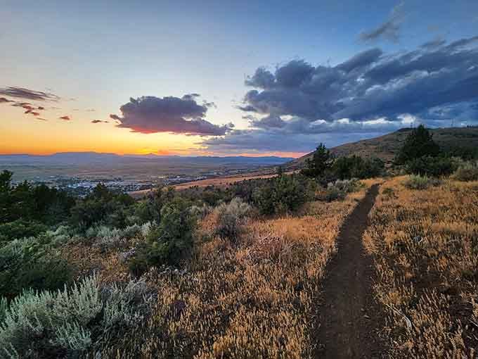 Noni's Trails West Trailhead at sunset, where your next adventure begins with views that justify the climb.