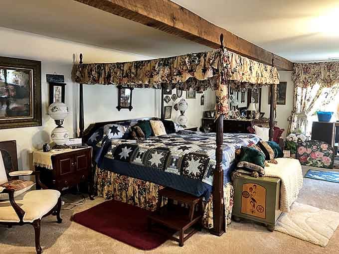 Exposed beams and quilted bedding create a bedroom that's equal parts authentic farmhouse and surprisingly luxurious retreat.