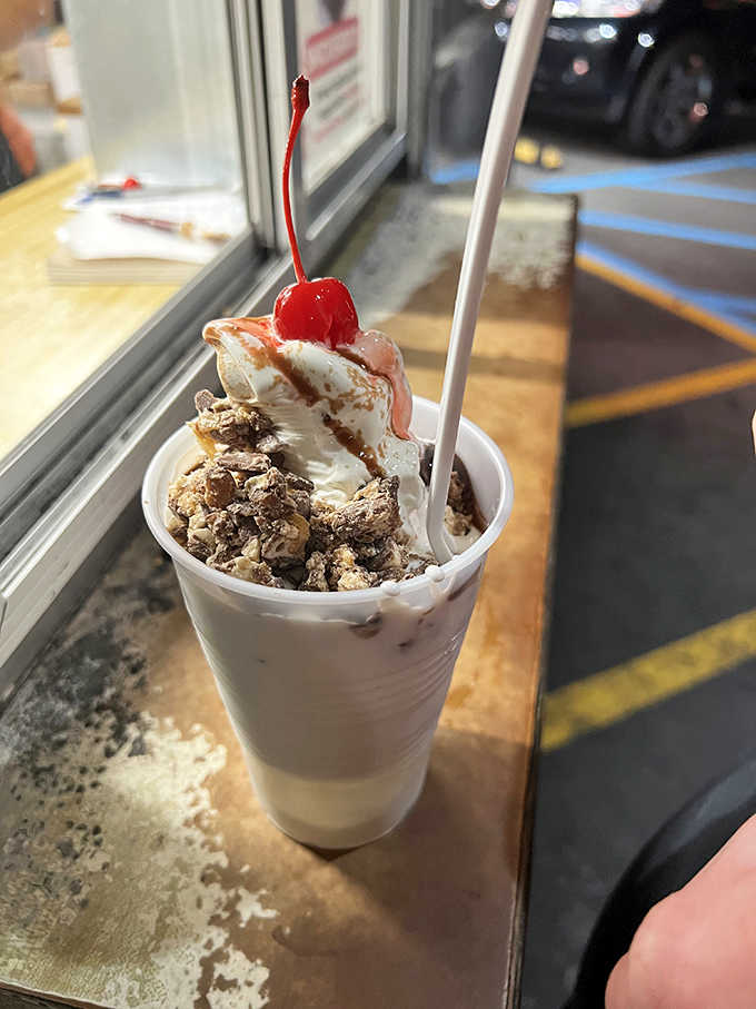 Layers of brownie chunks, whipped cream, and cherry-topped perfection make this sundae worth every delicious calorie you'll never regret.