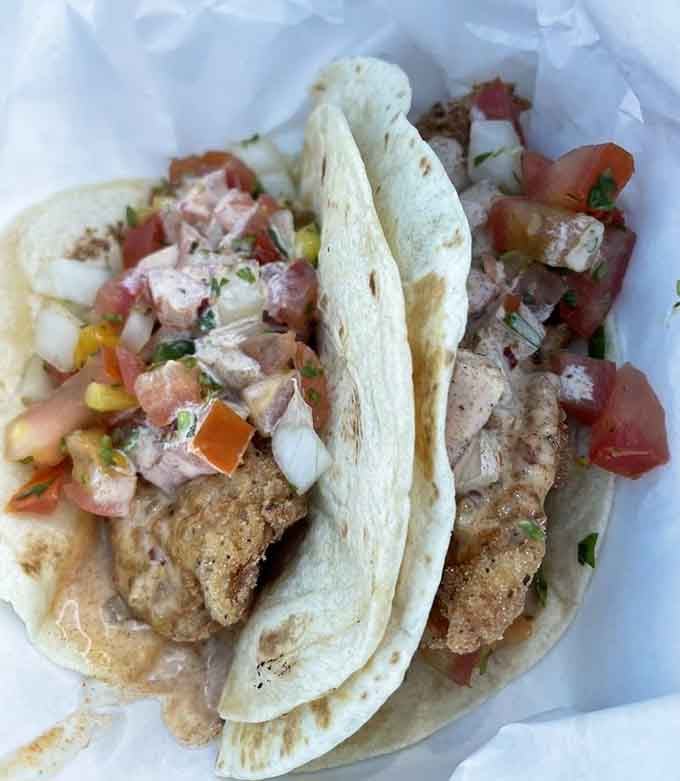 Shrimp tacos loaded with colorful toppings prove that great seafood doesn't need to be complicated to be absolutely delicious.
