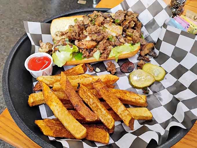 That cheesesteak comes loaded with seasoned fries, because sometimes you need comfort food that actually comforts you properly.