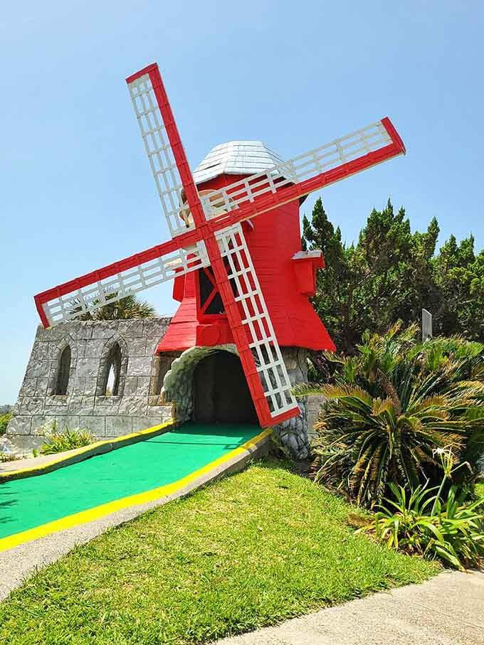 That red windmill has seen more dramatic putting failures than a professional golf tournament's highlight reel.