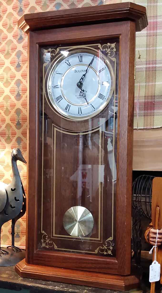 A Bulova wall clock with that classic pendulum swing brings the kind of elegance your smartphone can't match.