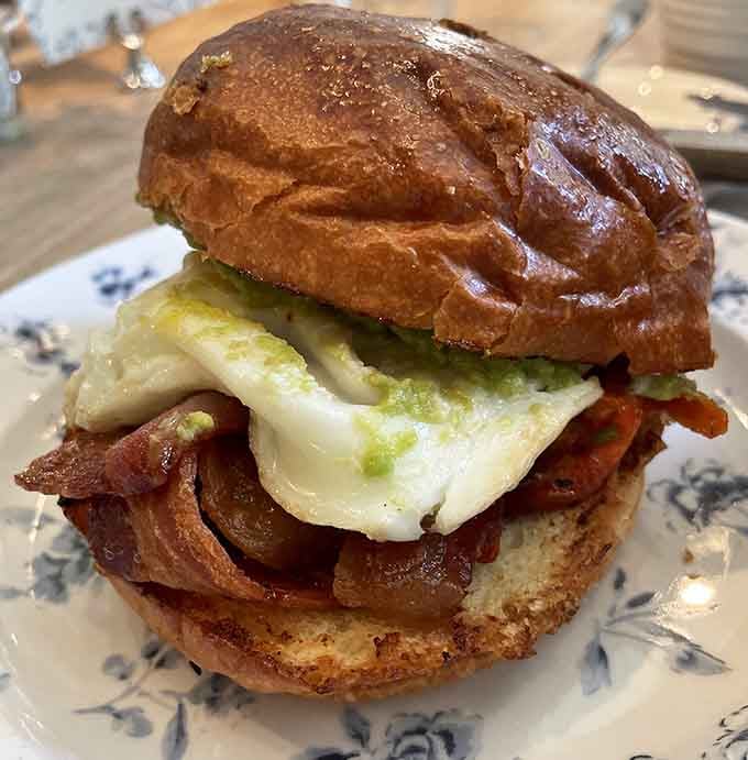 This croissant sandwich situation proves that breakfast doesn't need a specific time slot to be absolutely magnificent and life-changing.