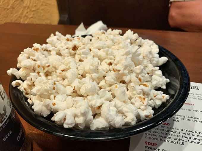 Complimentary popcorn at a Mexican restaurant feels like finding money in your winter coat, pure unexpected joy.