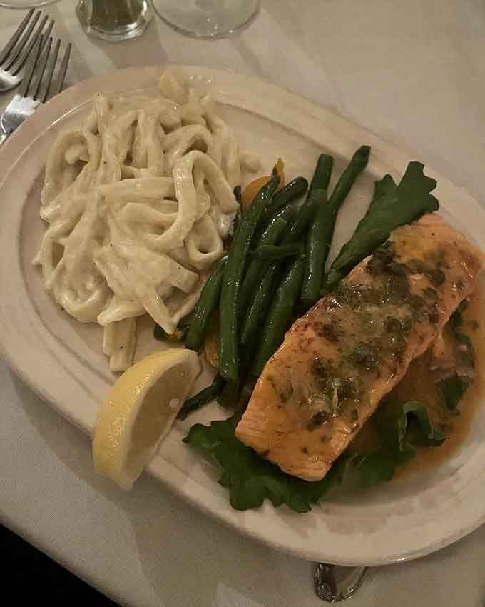 Fettuccine and salmon proving that surf and turf's Italian cousin deserves equal respect and adoration.