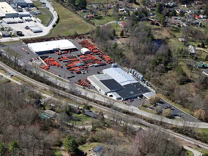 The town's industrial heritage meets modern commerce, all nestled within those ancient crater walls.
