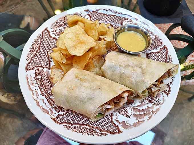 This chicken wrap comes with chips because even magical forest cafes understand the importance of proper lunch accompaniments.