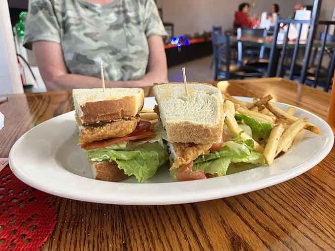 This fried chicken sandwich comes stacked high with crispy goodness and zero regrets about your life choices.