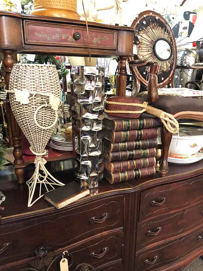 Leather-bound books and wicker treasures whisper stories from decades past, waiting for new chapters.