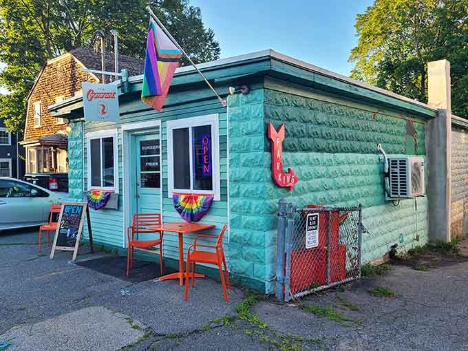 The Cormorant's turquoise exterior pops like a cheerful postcard, promising good times and even better food inside those colorful walls.