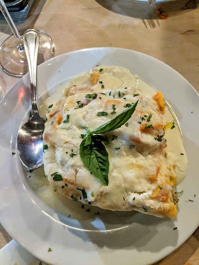 Fresh basil on top like a crown because this dish deserves royal treatment and your undivided attention.