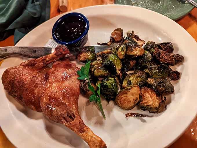 Crispy duck paired with roasted Brussels sprouts shows this kitchen knows how to balance richness with earthy, caramelized vegetables.