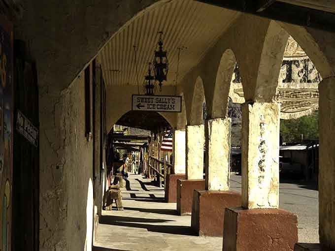 Arched walkways create shadows and light patterns that photographers dream about and tourists accidentally capture while trying to photograph burros.