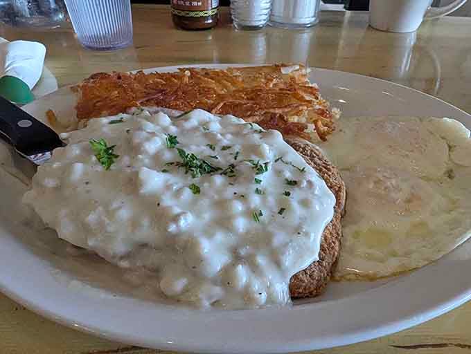 Chicken and waffles smothered in gravy&mdash;because sometimes breakfast needs to be both sweet and gloriously, unapologetically savory.