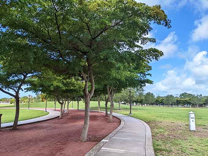 Shaded walking paths wind through mature trees, offering peaceful strolls when you need a break from all that joyful chaos.