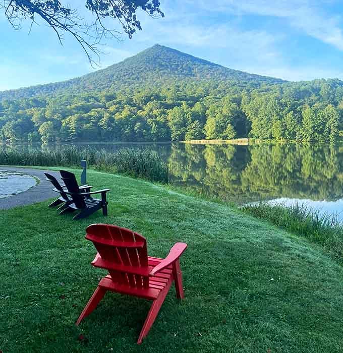 Those Adirondack chairs aren't just furniture, they're front-row seats to the greatest show mountains and water can perform together.