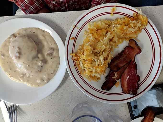 When your biscuits and gravy come with bacon and perfectly crisped hash browns, you know someone gets it.