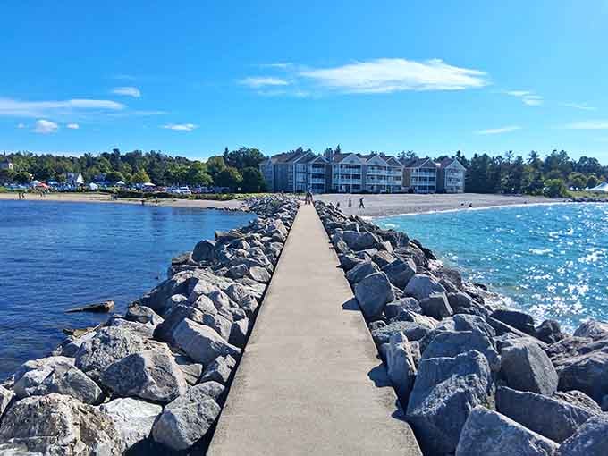This jetty stretches into Little Traverse Bay like a concrete runway to paradise, minus the TSA lines and overpriced airport sandwiches.