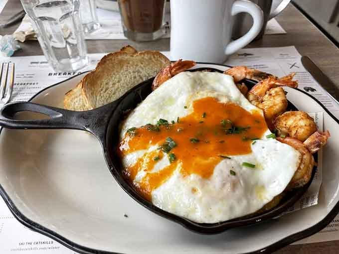 When eggs meet crispy potatoes in a cast-iron skillet, magic happens, especially with that perfectly runny yolk stealing the show.
