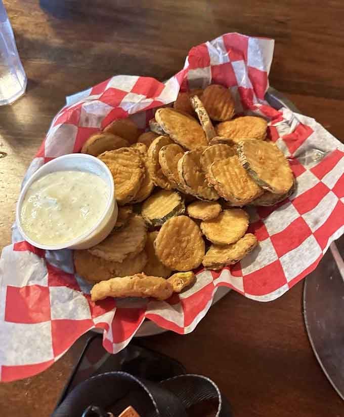 Fried pickles served in a basket, because apparently someone decided pickles needed to be even more addictive.