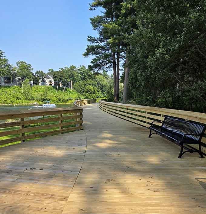 A wooden walkway with benches overlooking the lake is nature's way of saying "sit down and relax already."