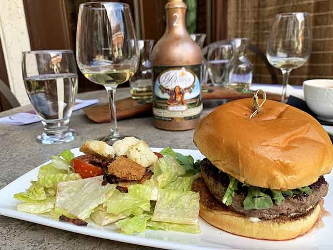 That burger paired with white wine is breaking all the rules, and honestly, we're here for the rebellion.
