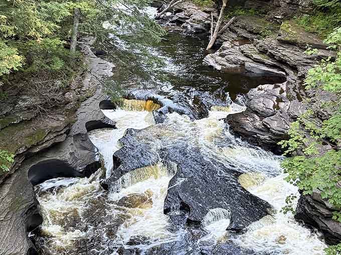 Nature's potholes carved into solid rock prove that water is the most patient sculptor in the business.