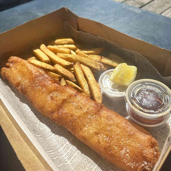 Takeout never looked so good: perfectly packaged fish and chips ready for your ferry ride home.