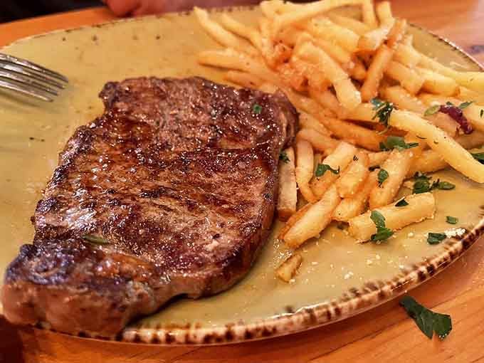 Steak frites done right, because apparently you can have your bowling shoes and eat well too.