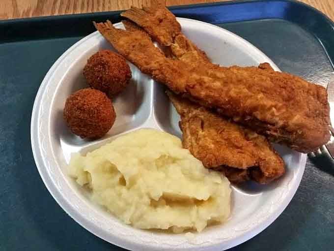 Golden fried catfish that would make your grandmother nod approvingly, served with sides that complete the picture perfectly.