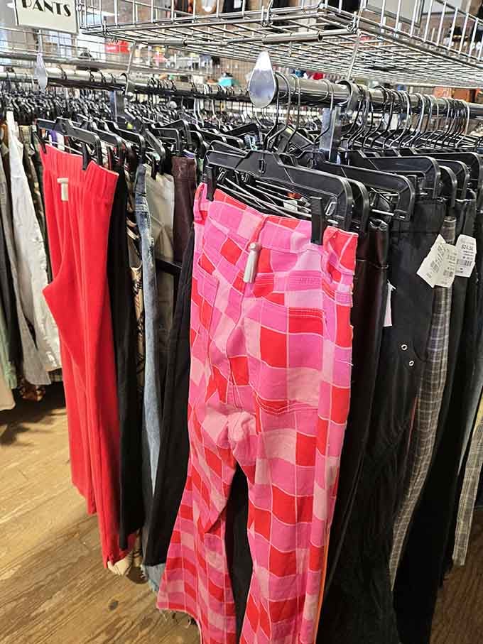 Pink plaid pants next to sensible black trousers proves this place understands both your wild side and Monday mornings.