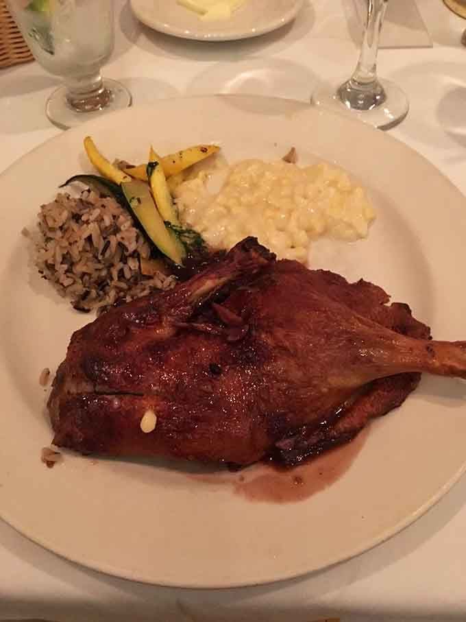 Duck served with mashed potatoes and wild rice, because sometimes poultry deserves the spotlight too.