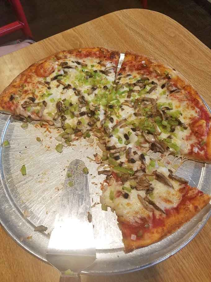 When mushrooms and green peppers throw a party on perfectly melted cheese, everyone wins big.