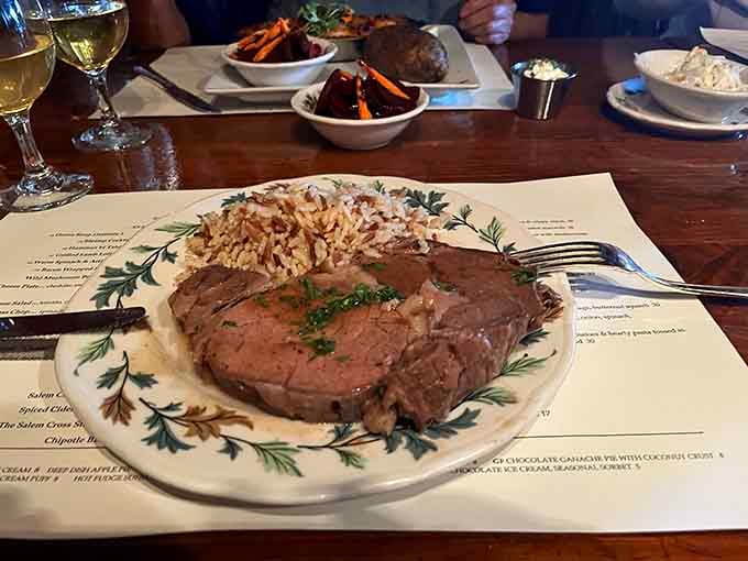 That beautiful pink center proves someone in the kitchen actually understands what medium-rare means, bless them.