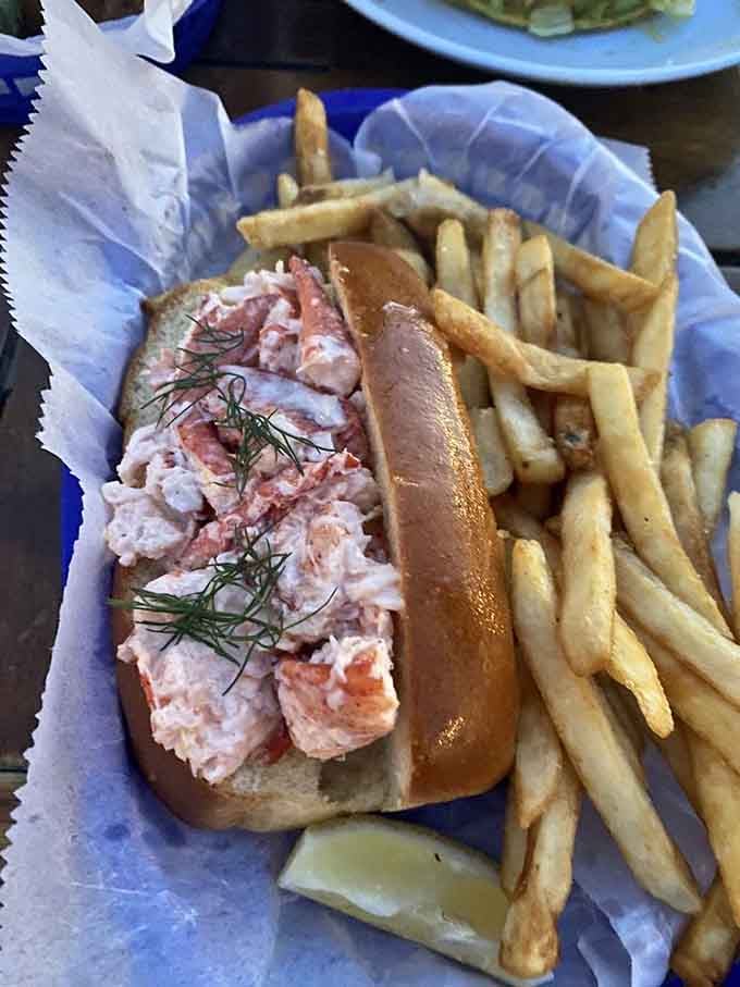 That lobster roll is stuffed so generously, it makes you question every other sandwich you've ever called "full."