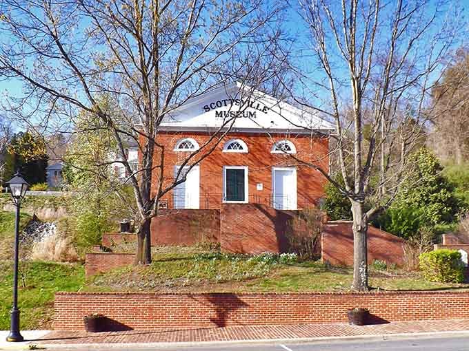 The Scottsville Museum stands proud on its brick terrace, preserving river town stories for curious visitors.
