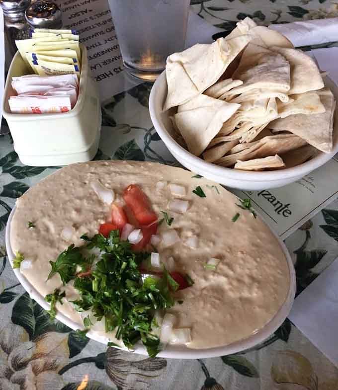Creamy baba ghanoush with warm pita is the kind of appetizer that makes you reconsider your entire relationship with eggplant.