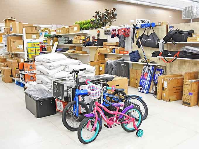 Colorful kids' bikes ready to create summer memories, training wheels included for the next generation of adventurers.