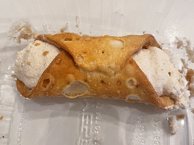 These cannoli are stuffed with sweet ricotta filling, proving that sometimes the simplest pleasures are the most satisfying ones.