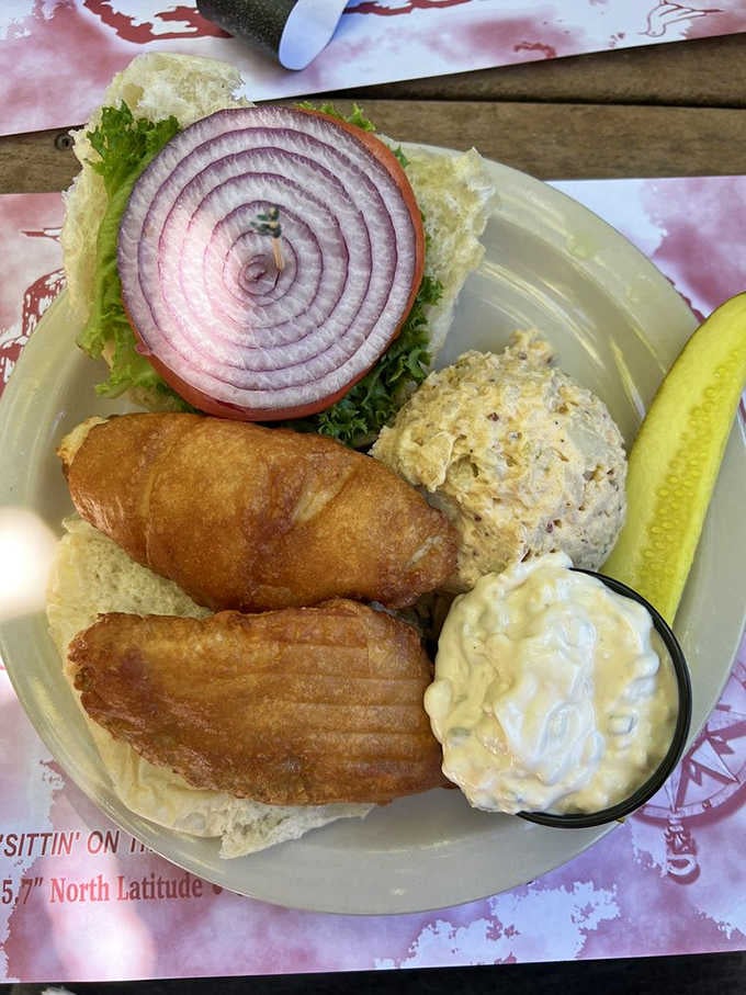 A perch sandwich so good it deserves its own fan club, complete with that essential pickle spear.