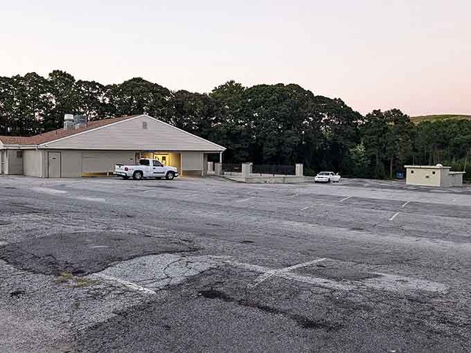 The concession stand and sprawling lot await their nightly transformation from empty asphalt to entertainment destination extraordinaire.