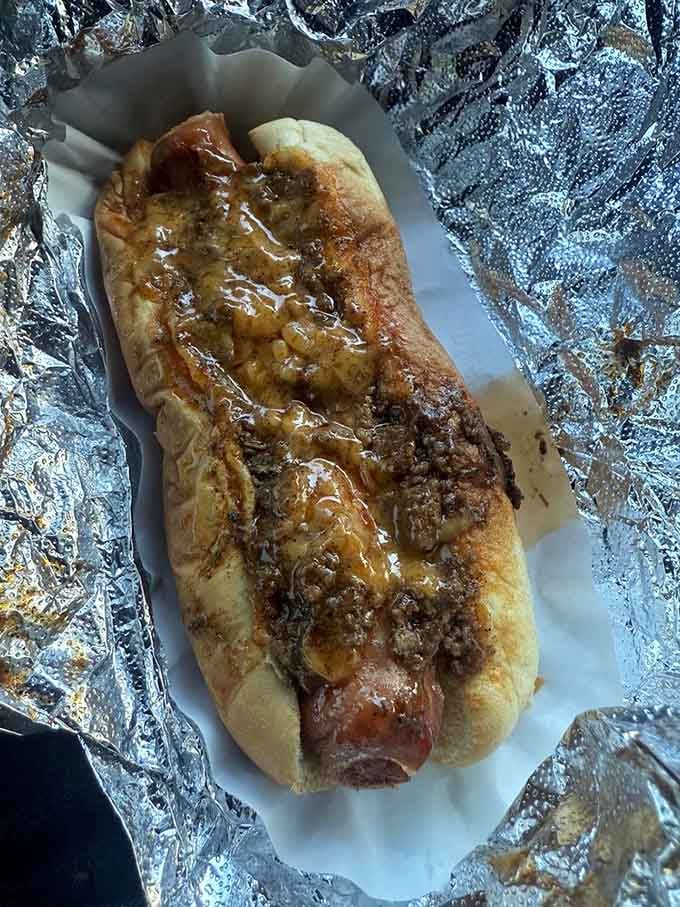 This chili cheese frank doesn't mess around; it's basically a warm hug wrapped in a bun.