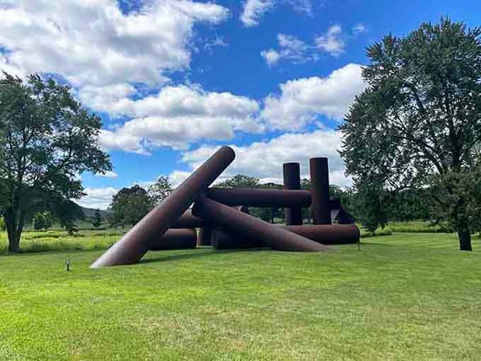 Massive steel pipes arranged in perfect chaos, because sometimes art needs to break all the rules.