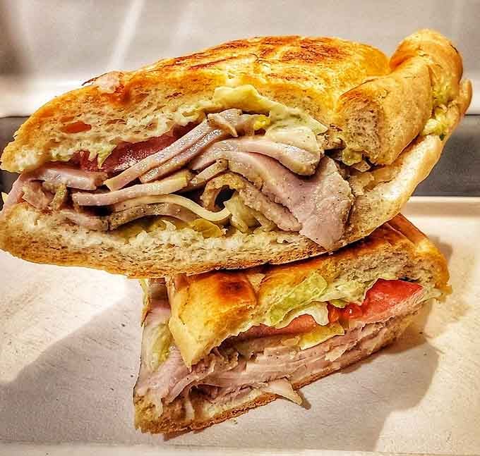 The classic pork Cuban, pressed to golden perfection, proves sometimes traditional is the way to go.