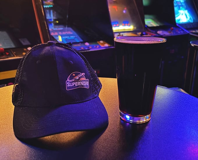 Supernova swag sits ready for purchase because sometimes you need a hat to commemorate your high score.