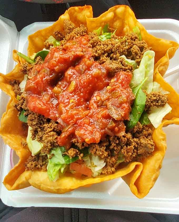 That taco salad shell holds enough flavor-packed goodness to fuel your own heroic adventures all afternoon long.